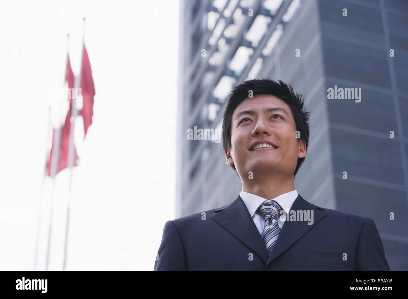 Young successful businessman stands hi-res stock photography and images ...