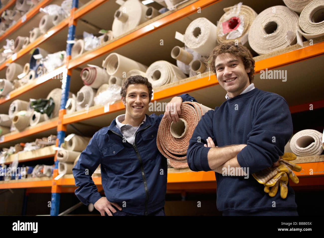 Two workers in warehouse Stock Photo - Alamy