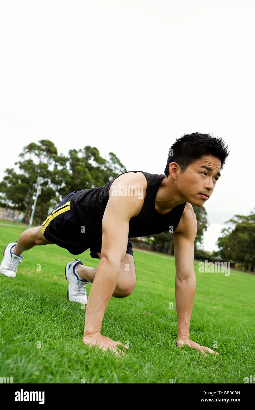 Man in starting position Stock Photo - Alamy