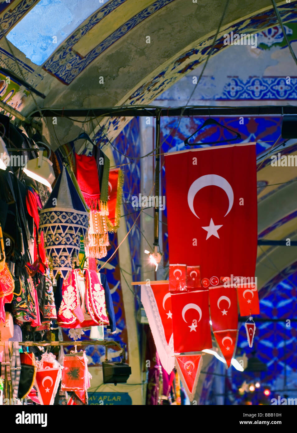 Grand Bazaar, Istanbul, Turkey; Turkish flags hanging in market place ...