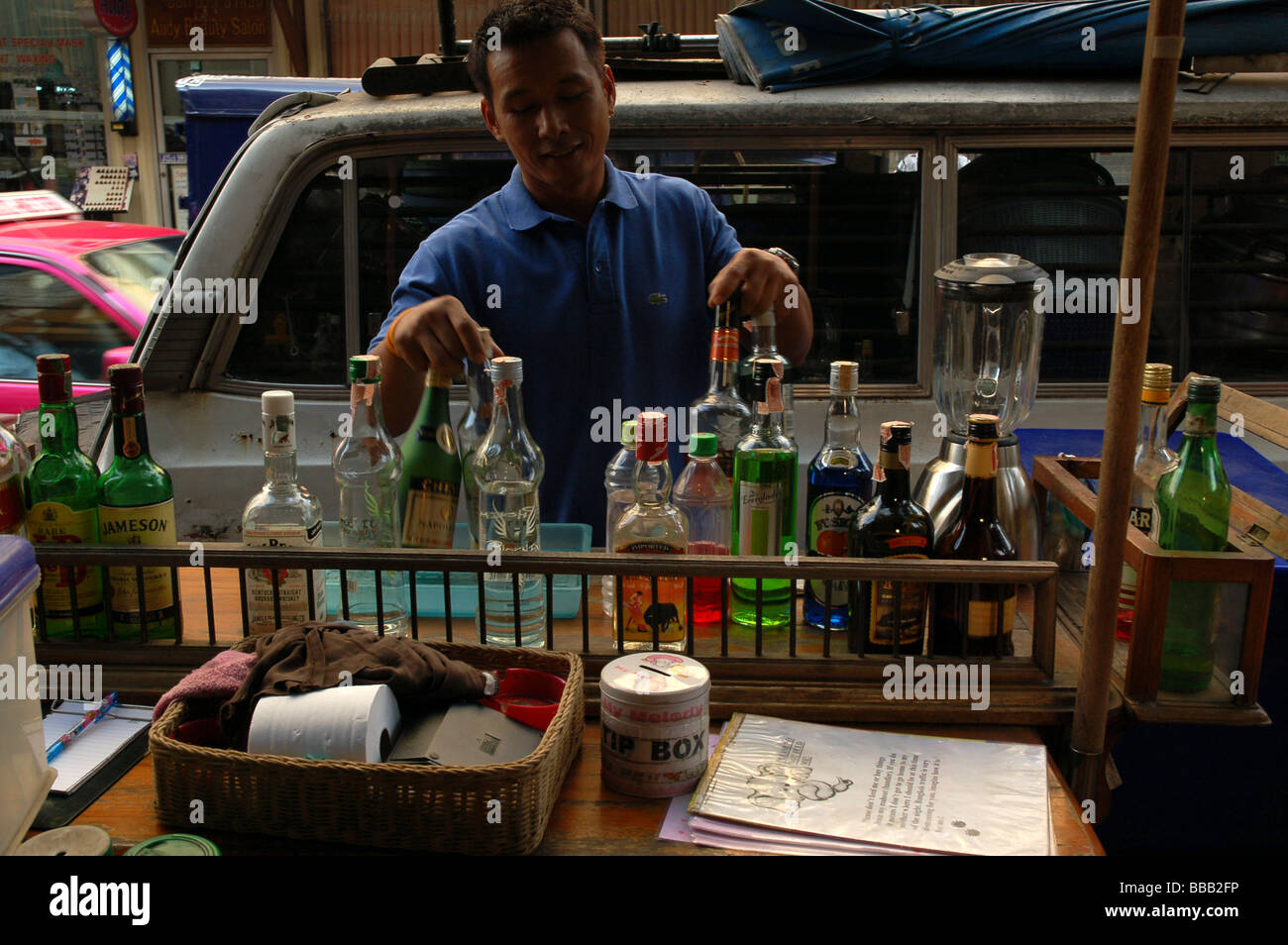 Thai man selling alcoholic drinks in Khao San Road, Bangkok, Thailand ...