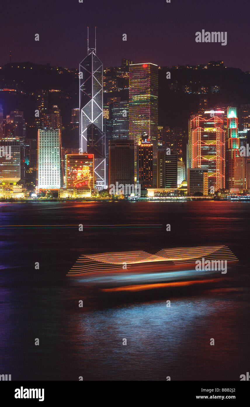 Hong Kong, Night view of Central across harbor Stock Photo - Alamy
