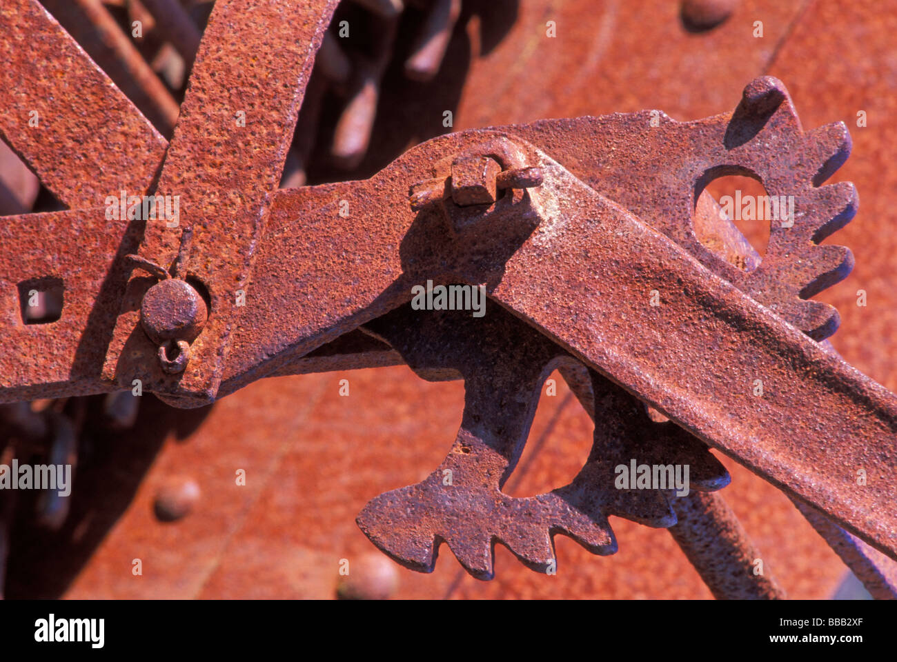 Rusty farm implements Stock Photo - Alamy