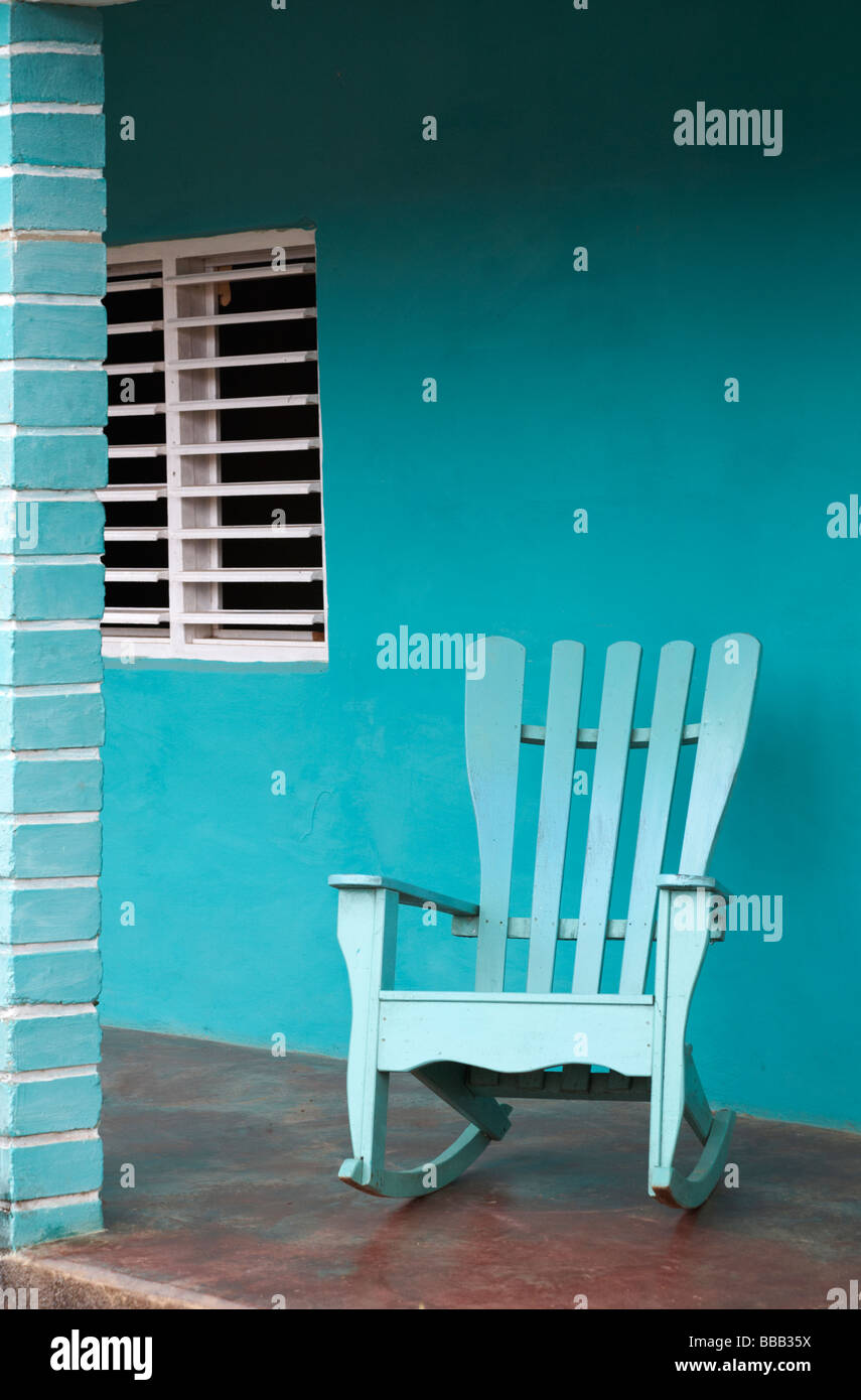 Traditional turquoise blue rocking chair on porch at Vinales, Pinar del ...