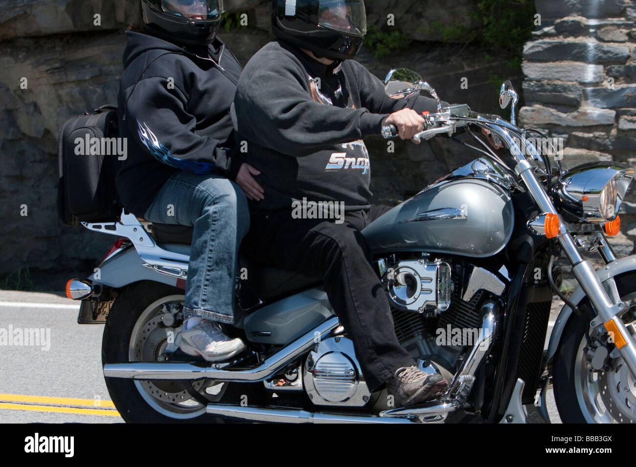 Two up riding on a touring motorbike motorcycle Stock Photo - Alamy