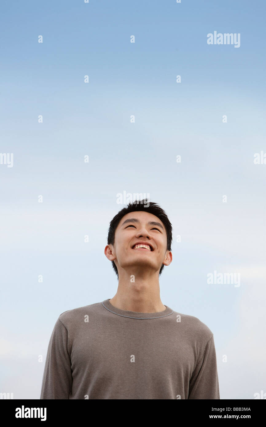 Man looking up Stock Photo - Alamy