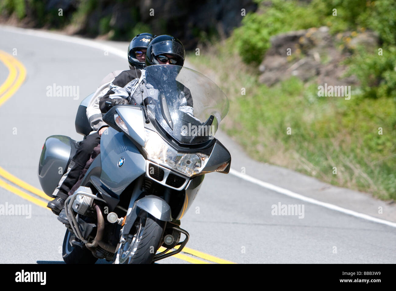 Two up riding on a touring motorbike motorcycle Stock Photo - Alamy