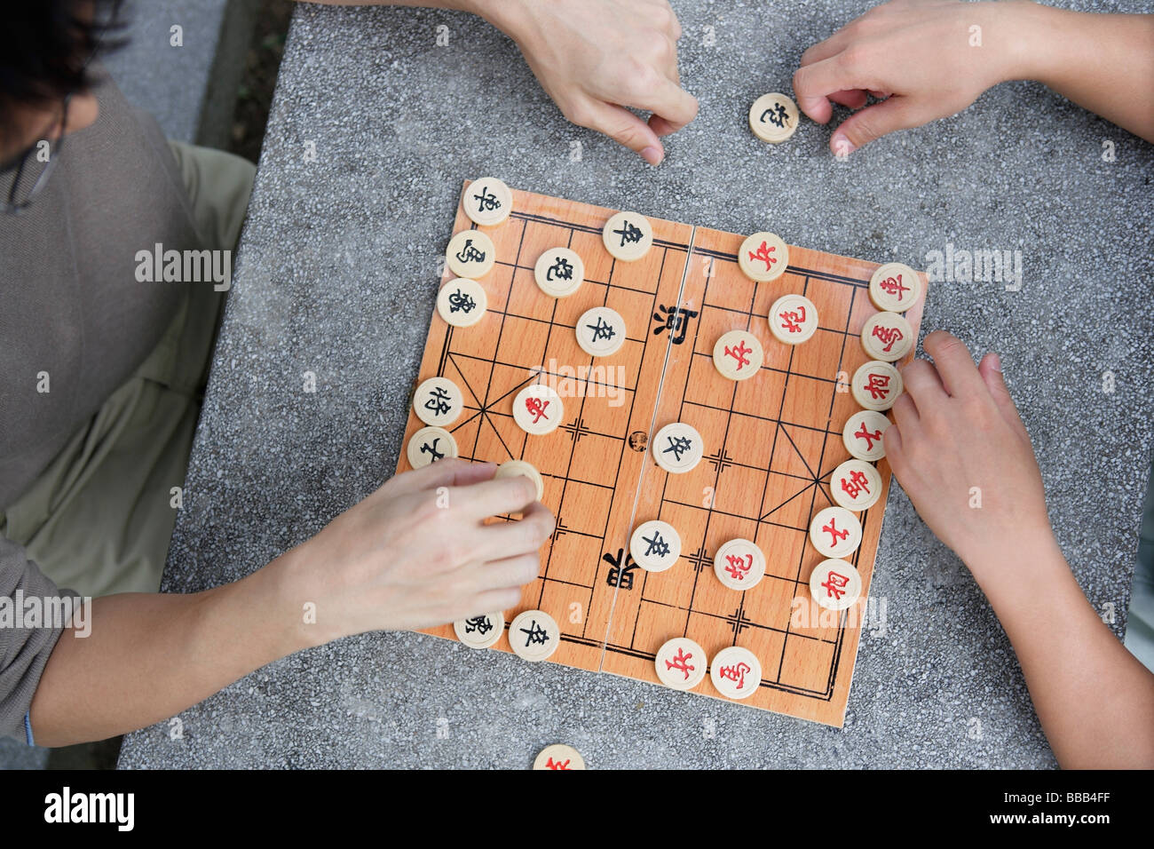 Top view of men playing Chinese chess Stock Photo - Alamy