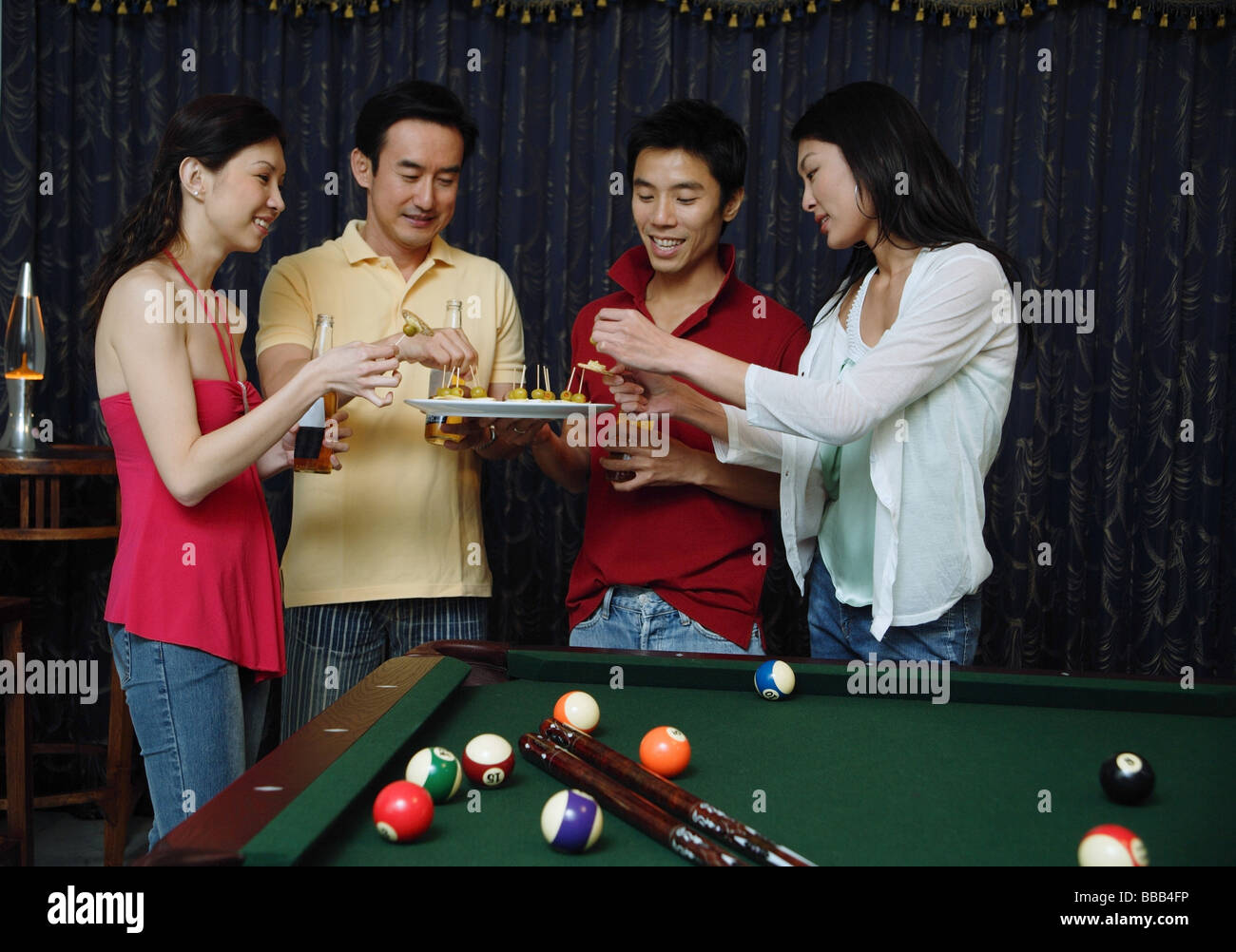 Couples eating appetizers hi-res stock photography and images - Alamy