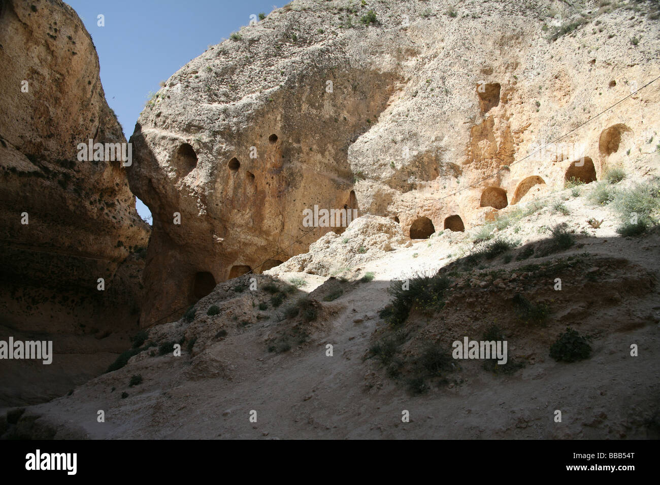 Rocks with caves carved into the rocks used as old homes at Maalula ...