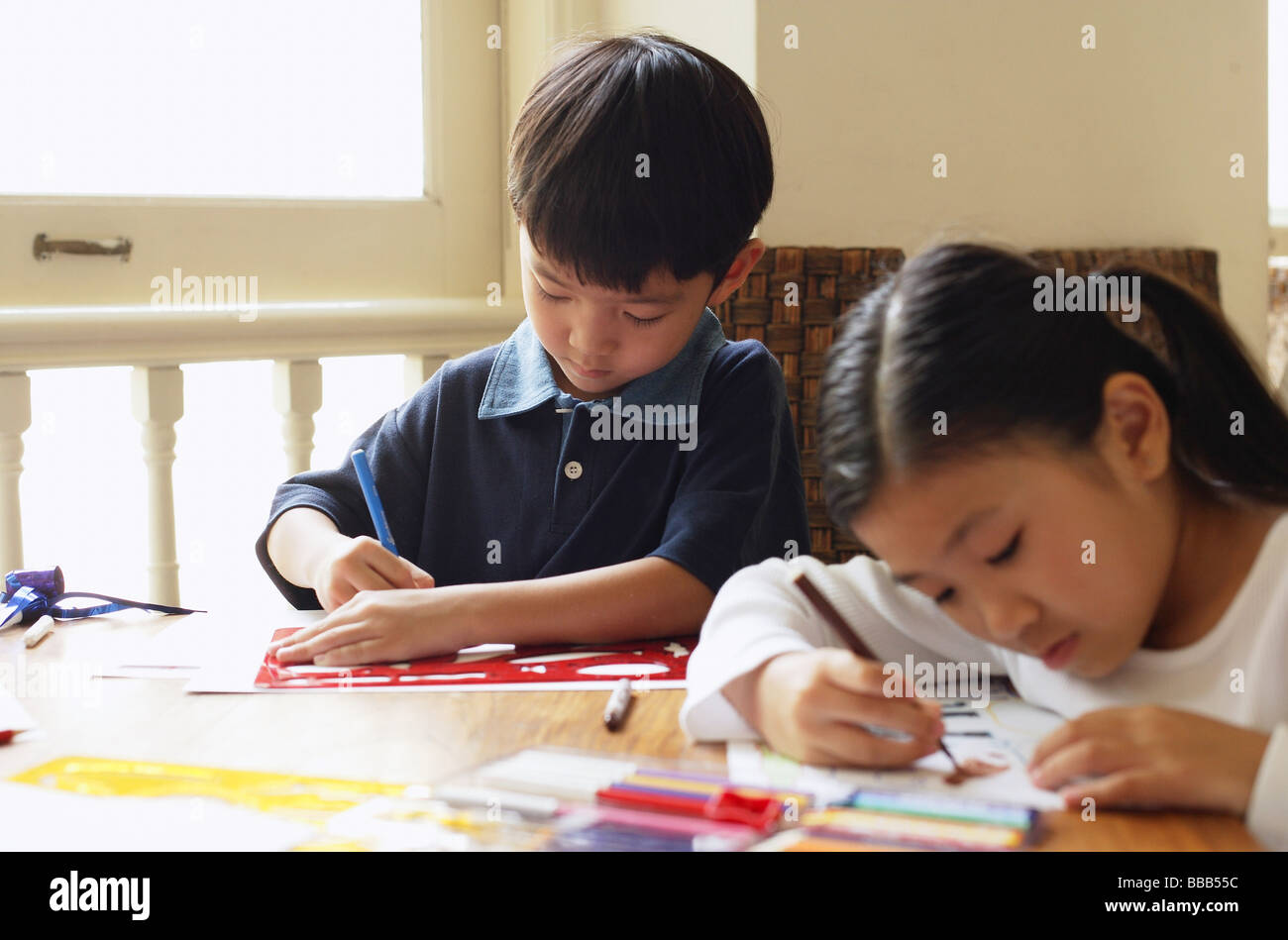 Children drawing with stencils Stock Photo - Alamy