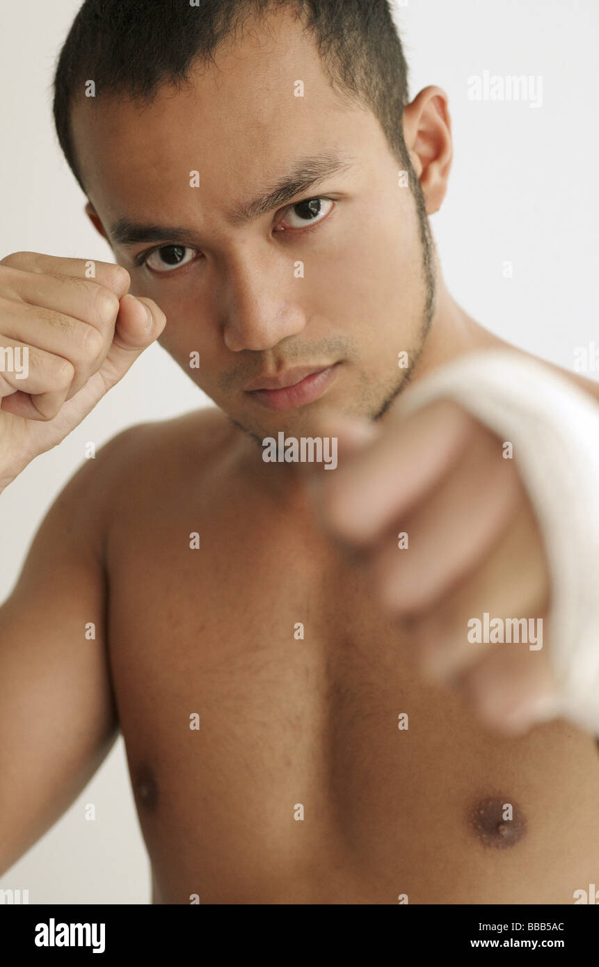 Man with bandage around his hand, boxing Stock Photo - Alamy