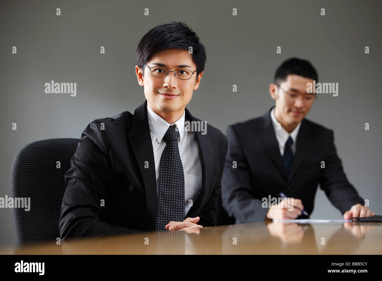 Businessmen in conference room Stock Photo - Alamy
