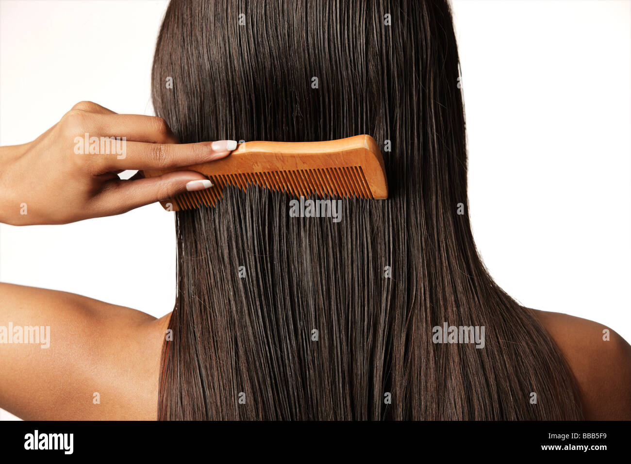 Pulling comb through hair hi-res stock photography and images - Alamy