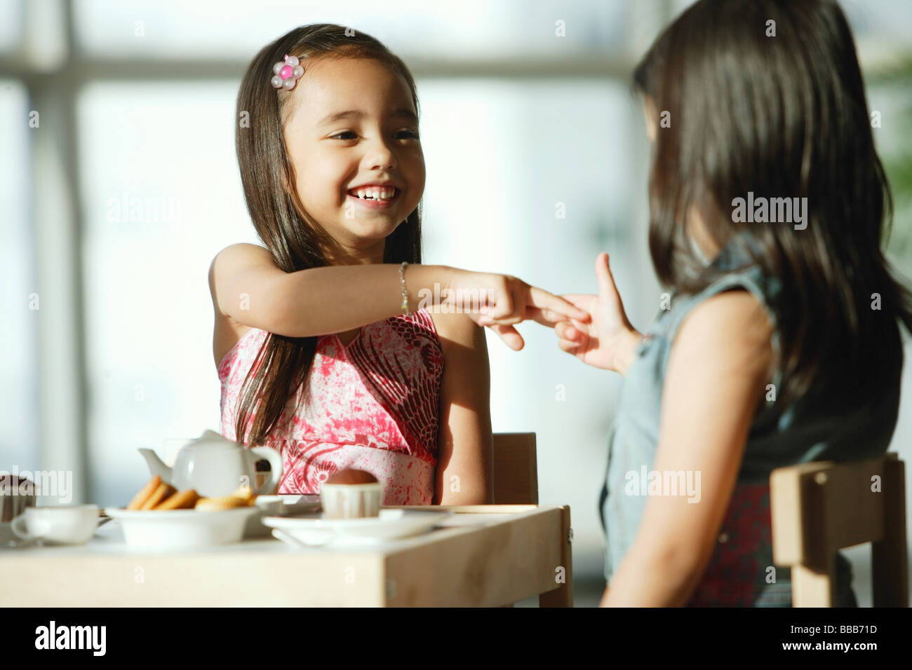 Children playing tea party hi-res stock photography and images - Alamy