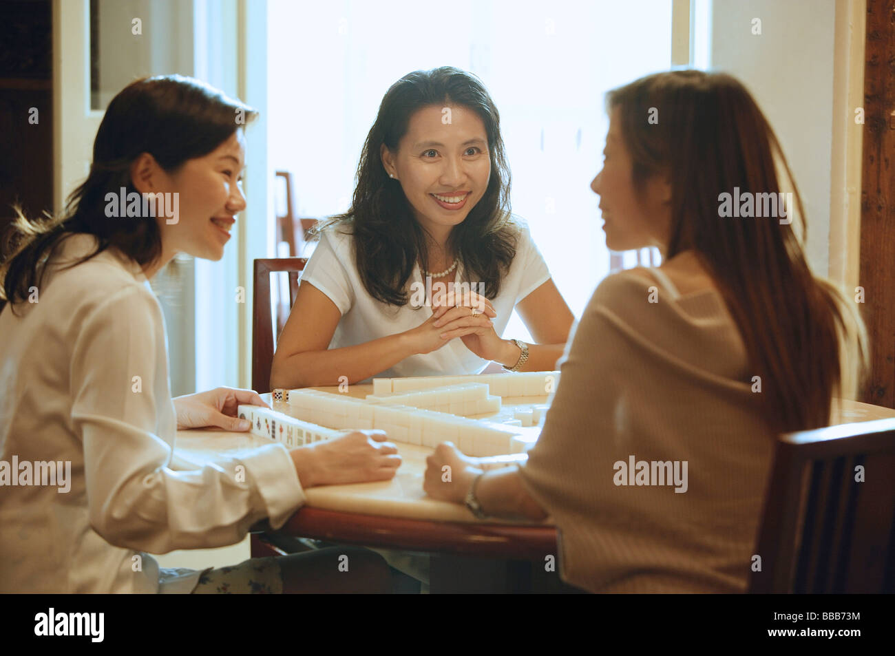 Women playing mahjong Stock Photo - Alamy