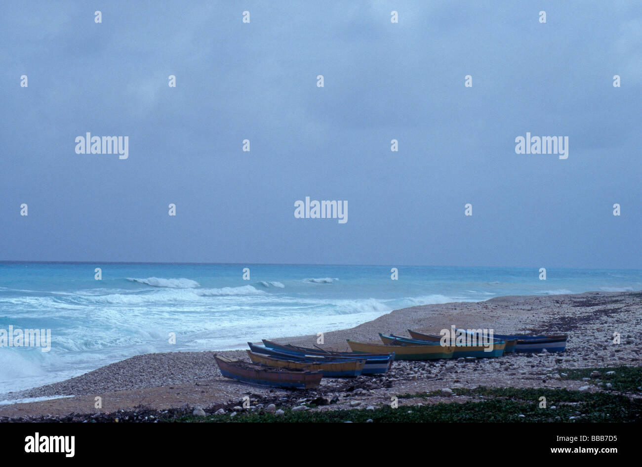 Fishing boats on a rocky beach, Barahona Peninsula, Dominican Republic ...