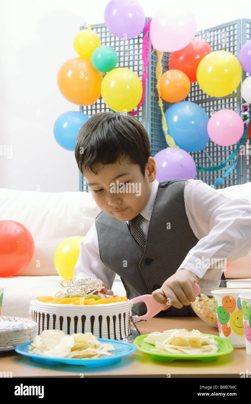 Child cutting colored paper hi-res stock photography and images - Alamy