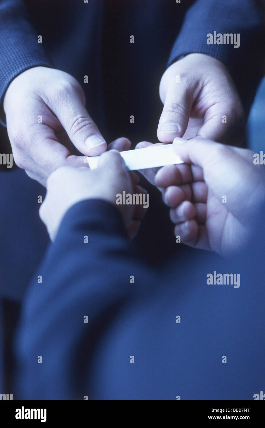 Hands exchanging business card hi-res stock photography and images - Alamy