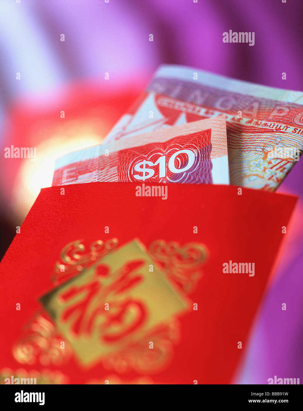 Singapore dollar in red packet hi-res stock photography and images - Alamy
