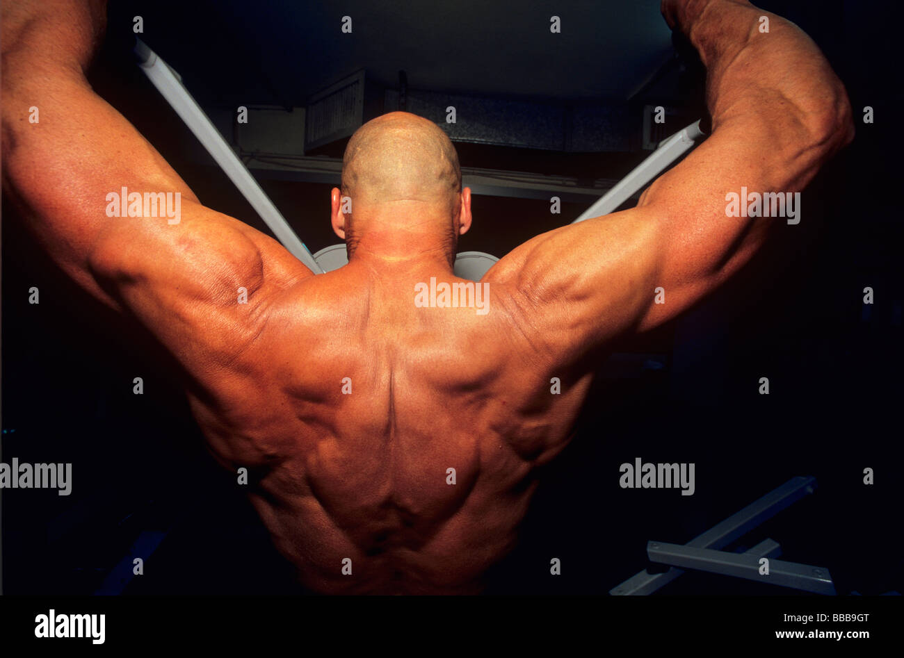 Body builder exercises vigorously Stock Photo - Alamy