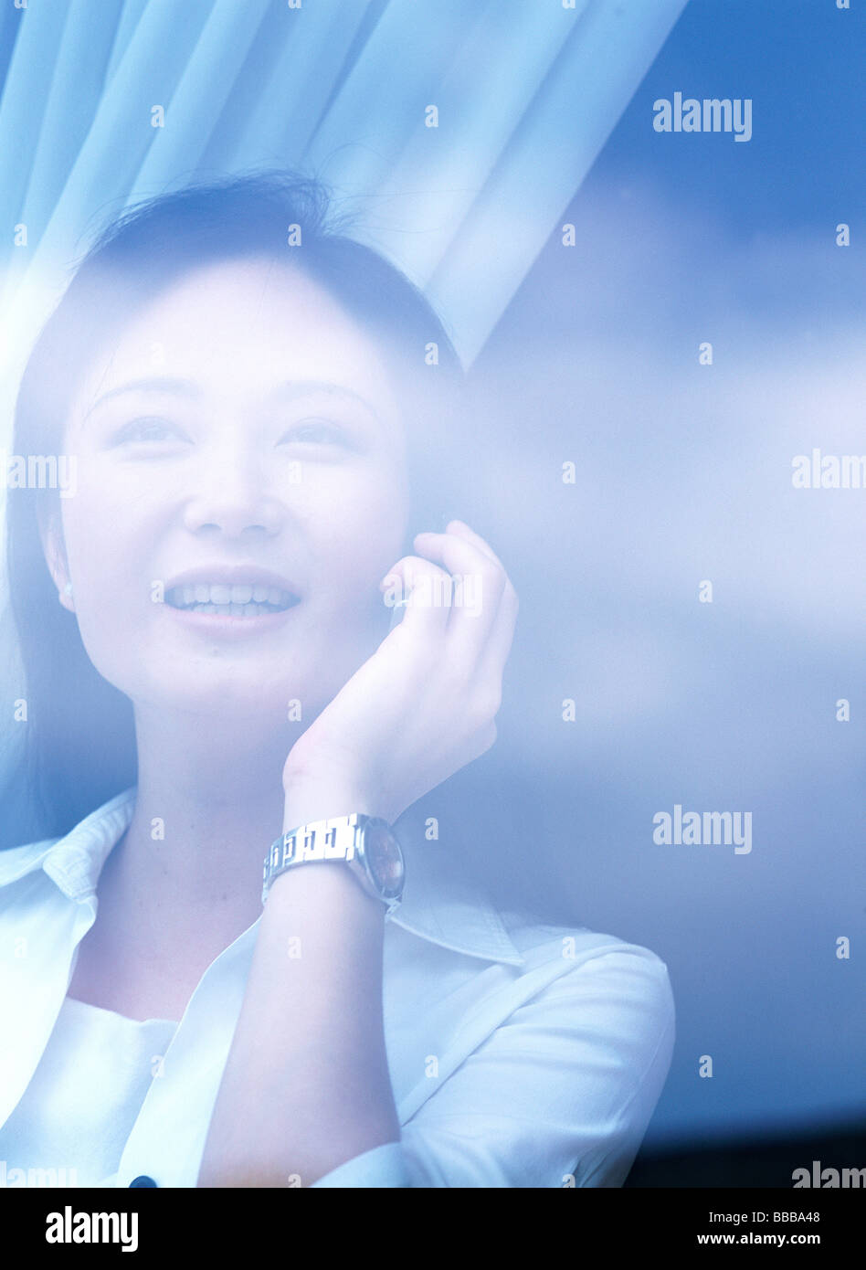 Woman behind a glass hi-res stock photography and images - Alamy