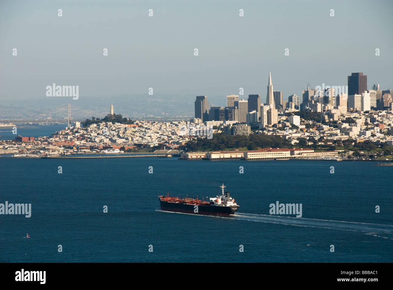 California Container ship entering San Francisco Bay; city skyline ...