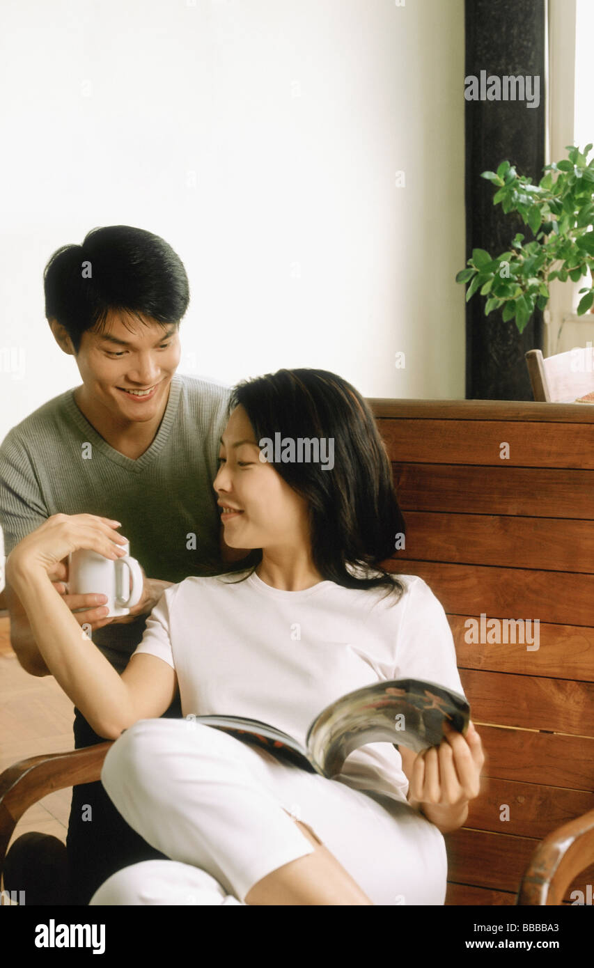 Couple talking at home Stock Photo - Alamy