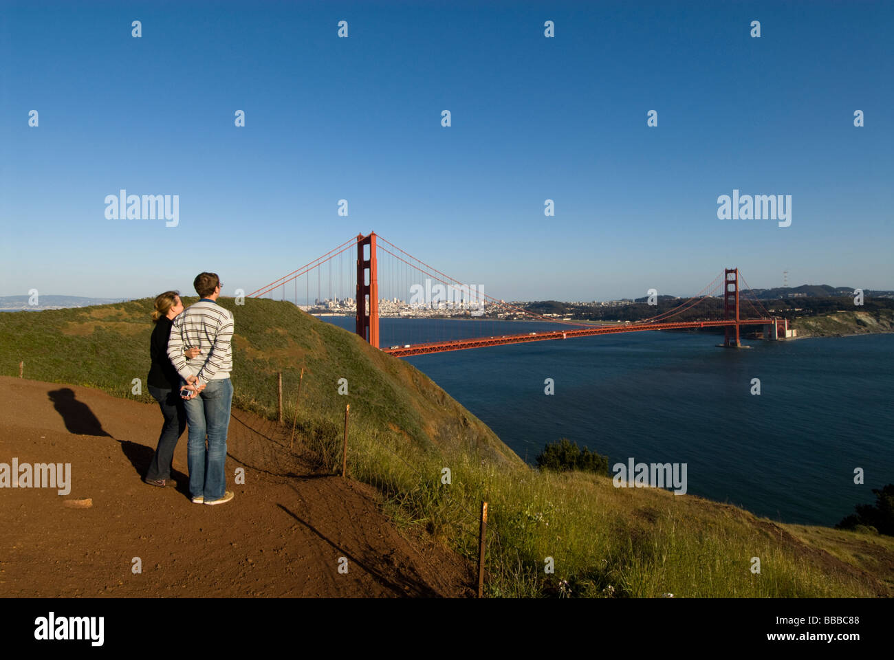 California Tourists overlooking Golden Gate Bridge; view of Golden Gate ...