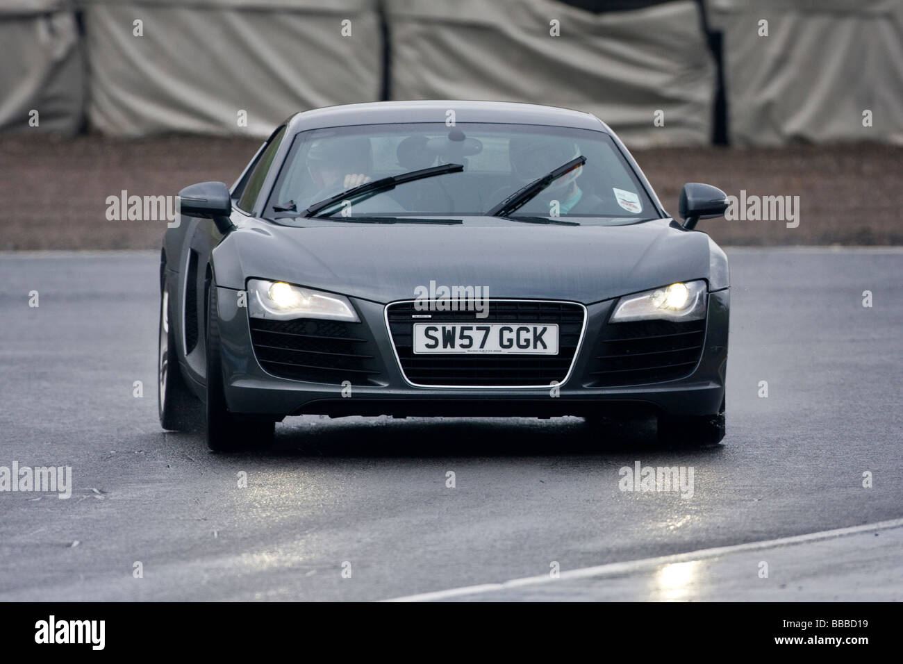 Audi R8 Supercar on wet track Stock Photo - Alamy