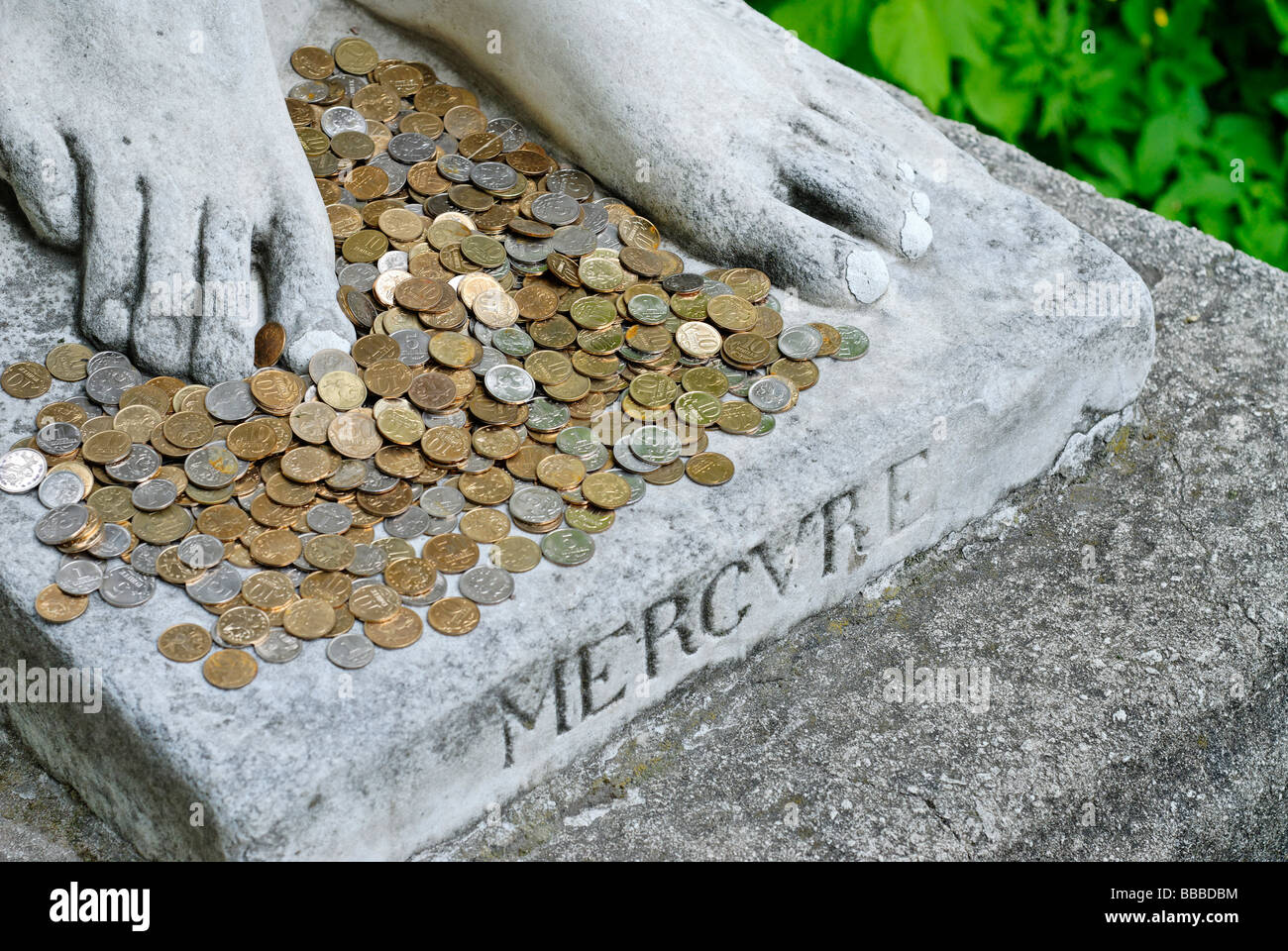 Russian coins at feet of God Mercury statue Stock Photo - Alamy