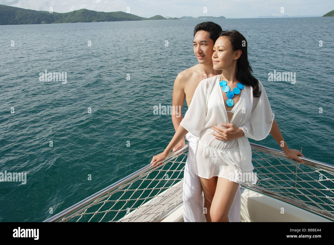 Couple standing on yacht, portrait Stock Photo - Alamy