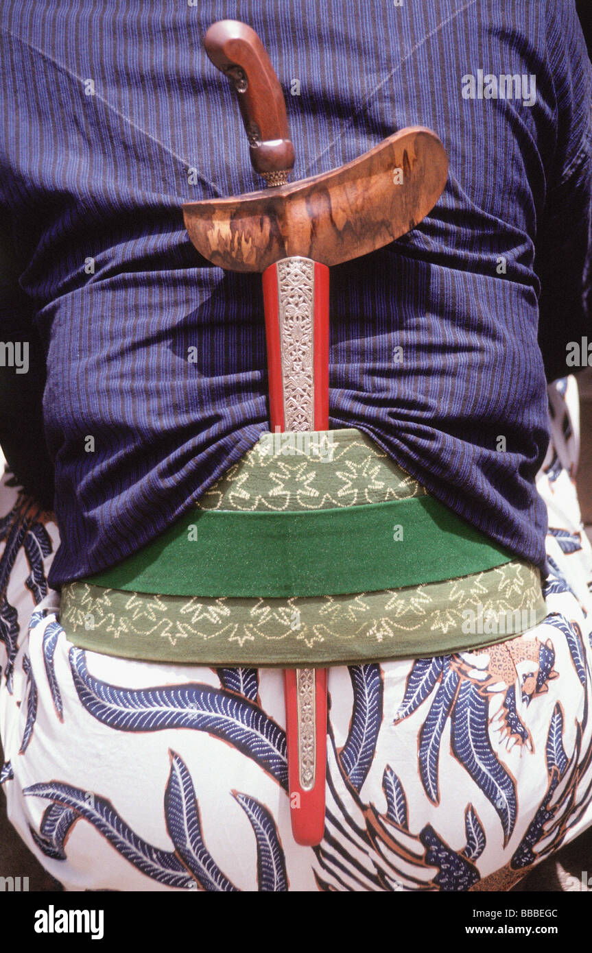 Indonesia, Yogyakarta, Kraton guard in traditional dress with kris ...