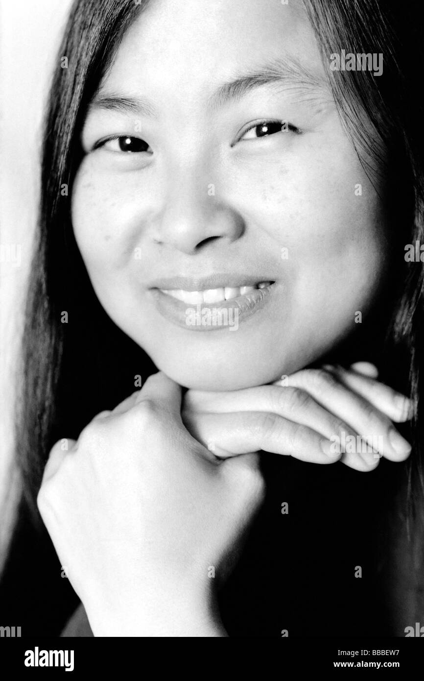 Smiling young woman hands Black and White Stock Photos & Images - Alamy
