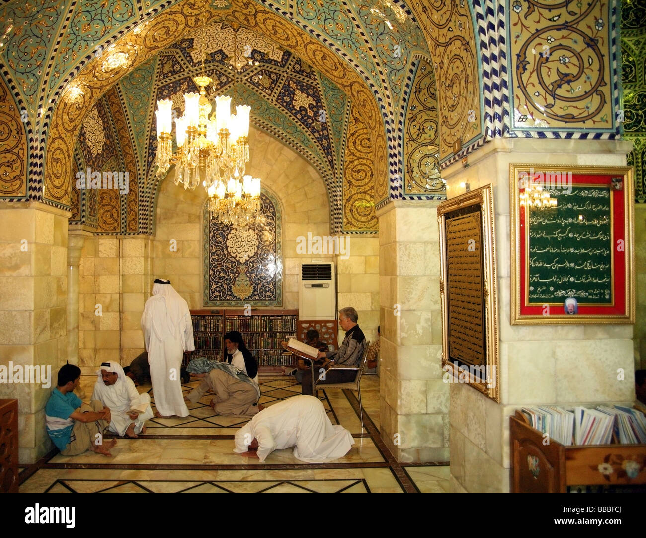 Men praying inside the Sayyida Ruqayya mosque Stock Photo - Alamy
