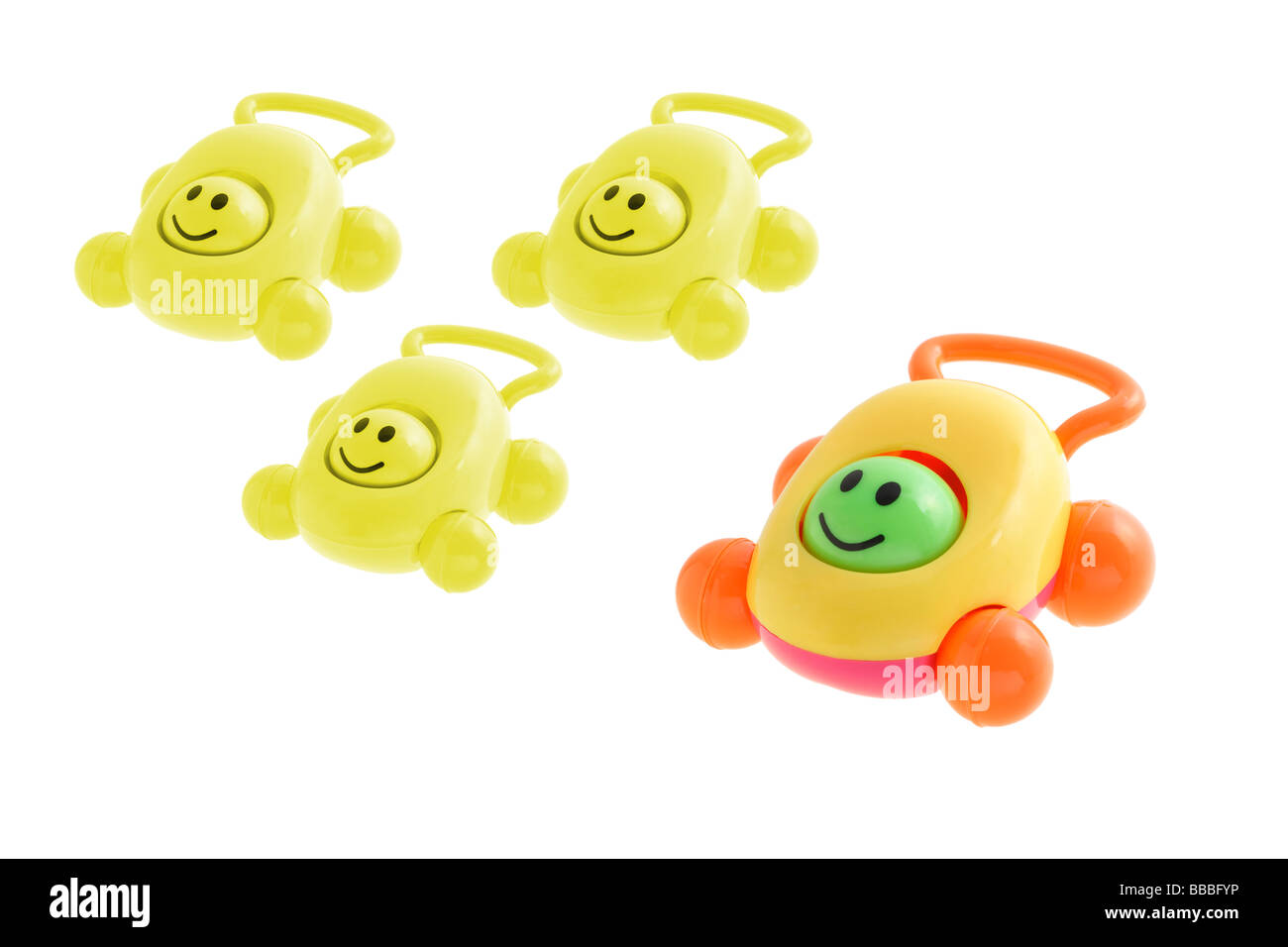 Colorful smiley baby rattle cars on white background Stock Photo - Alamy