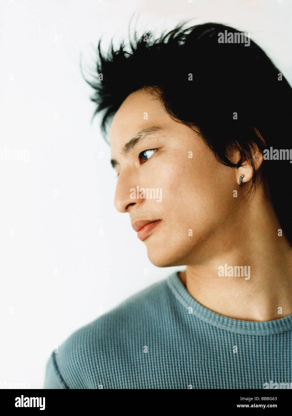 Profile of young man, white background Stock Photo - Alamy