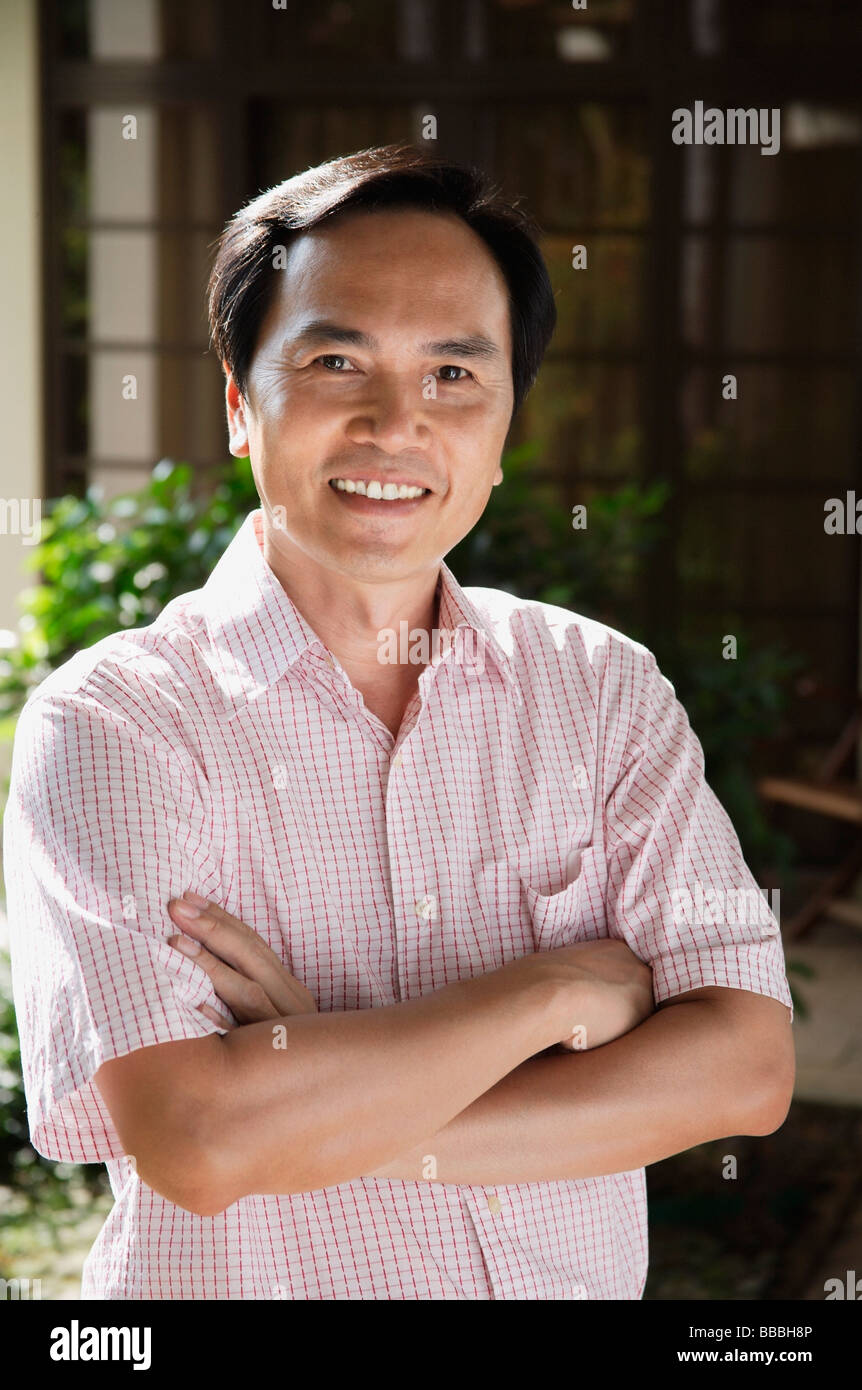 Man smiling at camera Stock Photo - Alamy