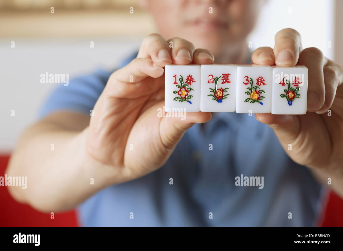 Close up of mahjong tiles with Chinese characters for Spring, Summer ...