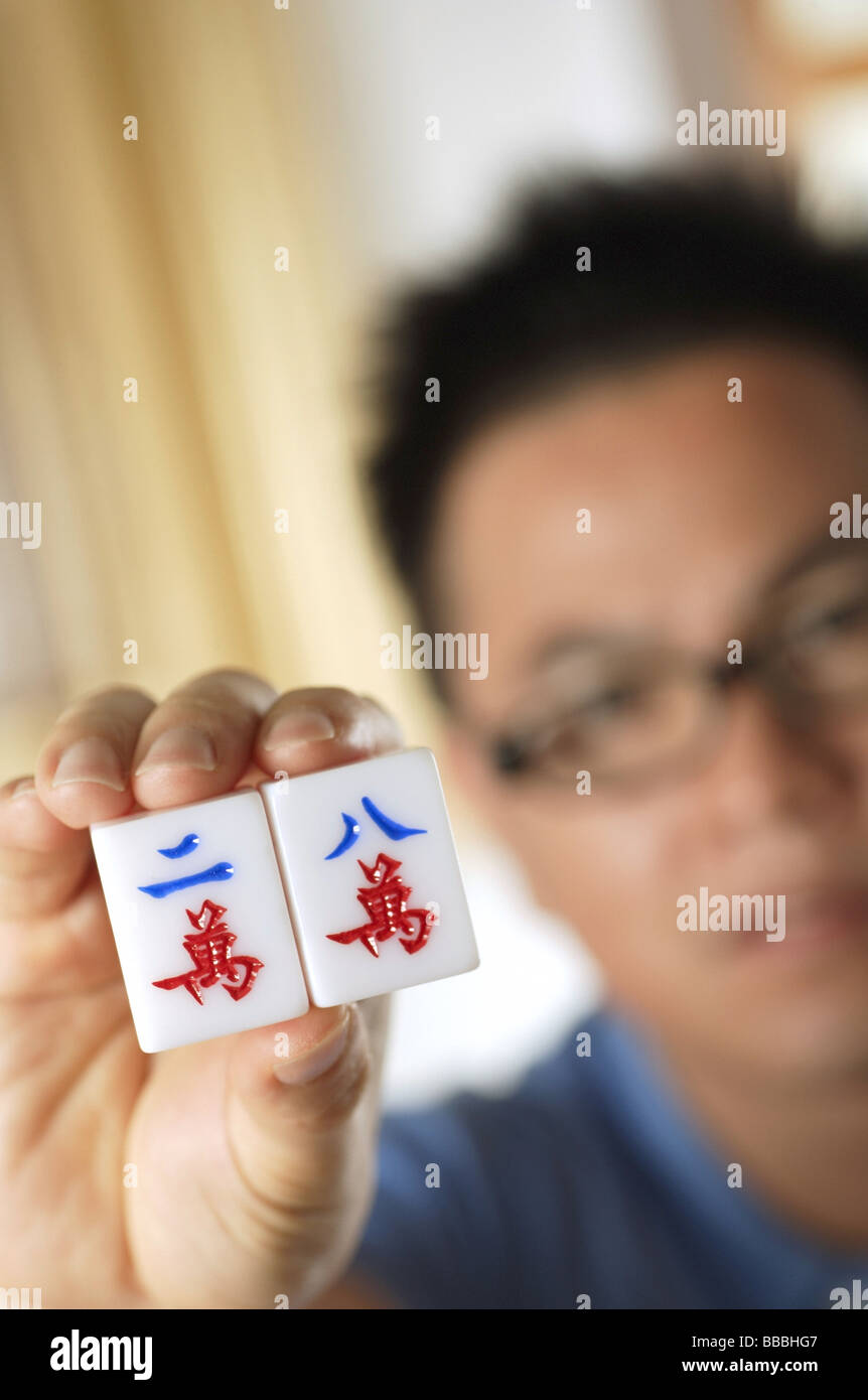 Close-up of mahjong tiles with Chinese characters for Two and Eight ...