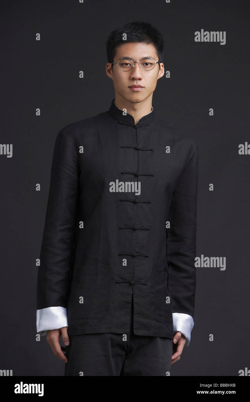 Man in traditional attire, looking at camera Stock Photo - Alamy