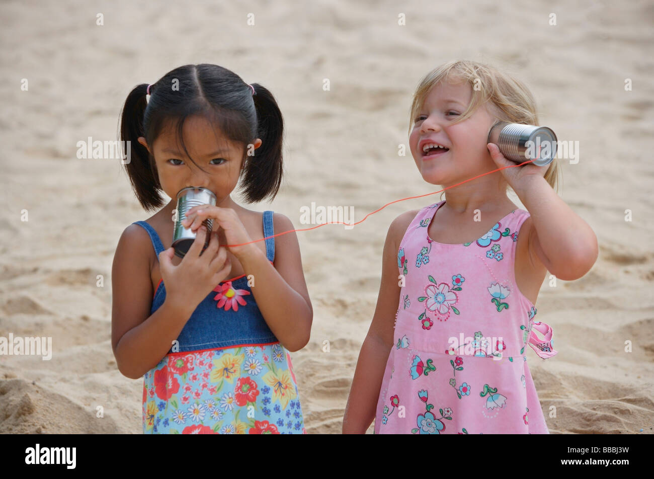 Girls playing with toy phones Stock Photo - Alamy