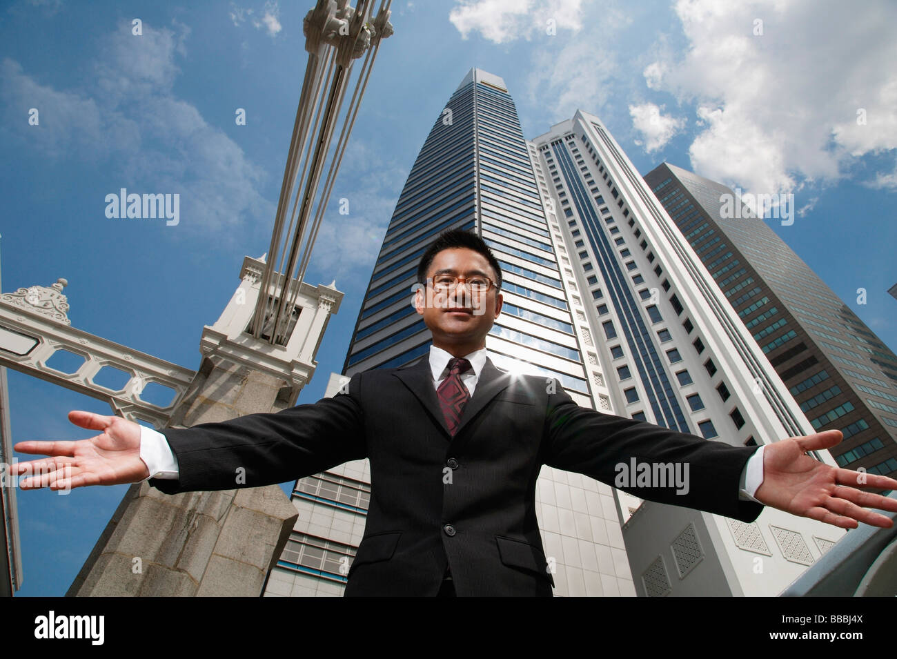 Businessman opening arms in welcome Stock Photo - Alamy