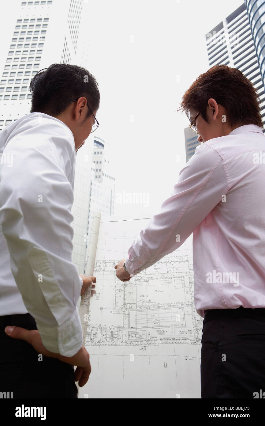 Men working at buildings hi-res stock photography and images - Alamy