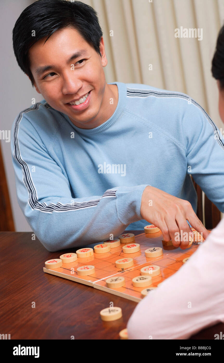 People table playing board game hi-res stock photography and images - Alamy