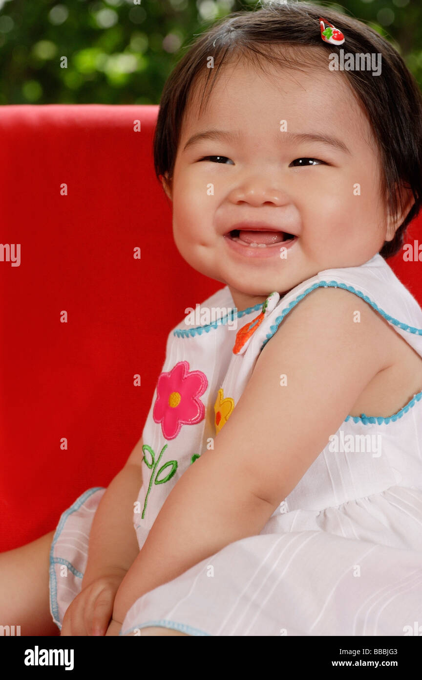 Baby girl smiling, portrait Stock Photo - Alamy