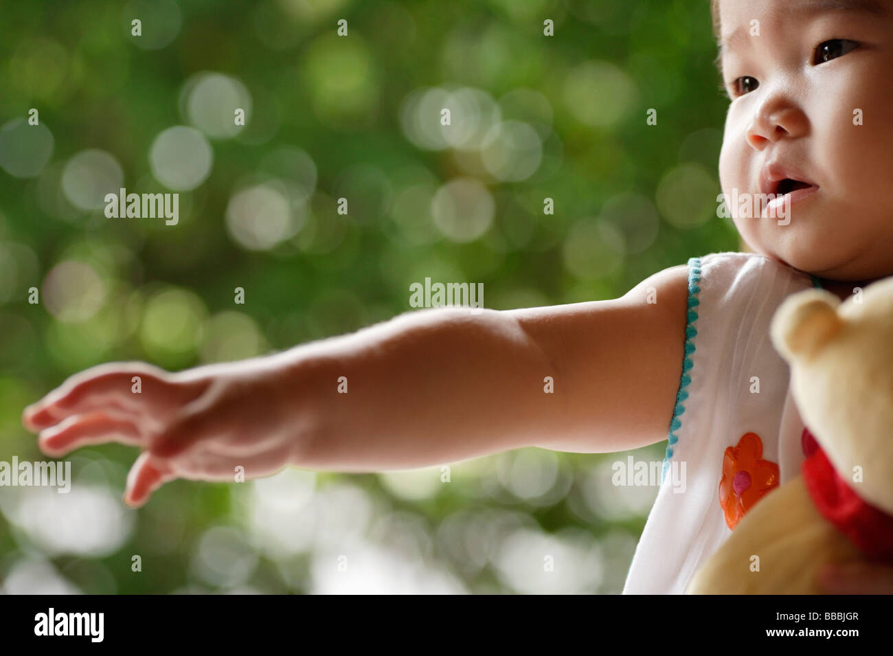 Arm outstretched asia hi-res stock photography and images - Alamy