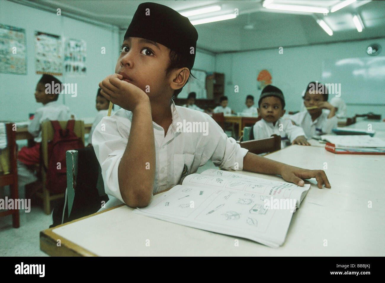 Malaysia, Kuala Lumpur, young Muslim boy in class at the National ...