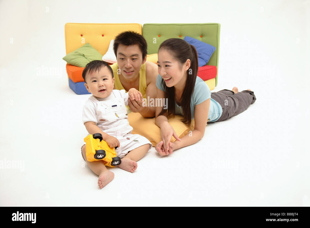 Young parents with one child, portrait Stock Photo - Alamy
