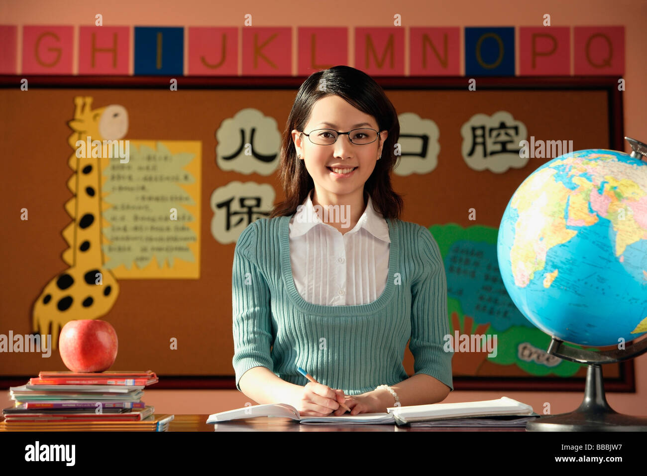 School teacher in class Stock Photo - Alamy